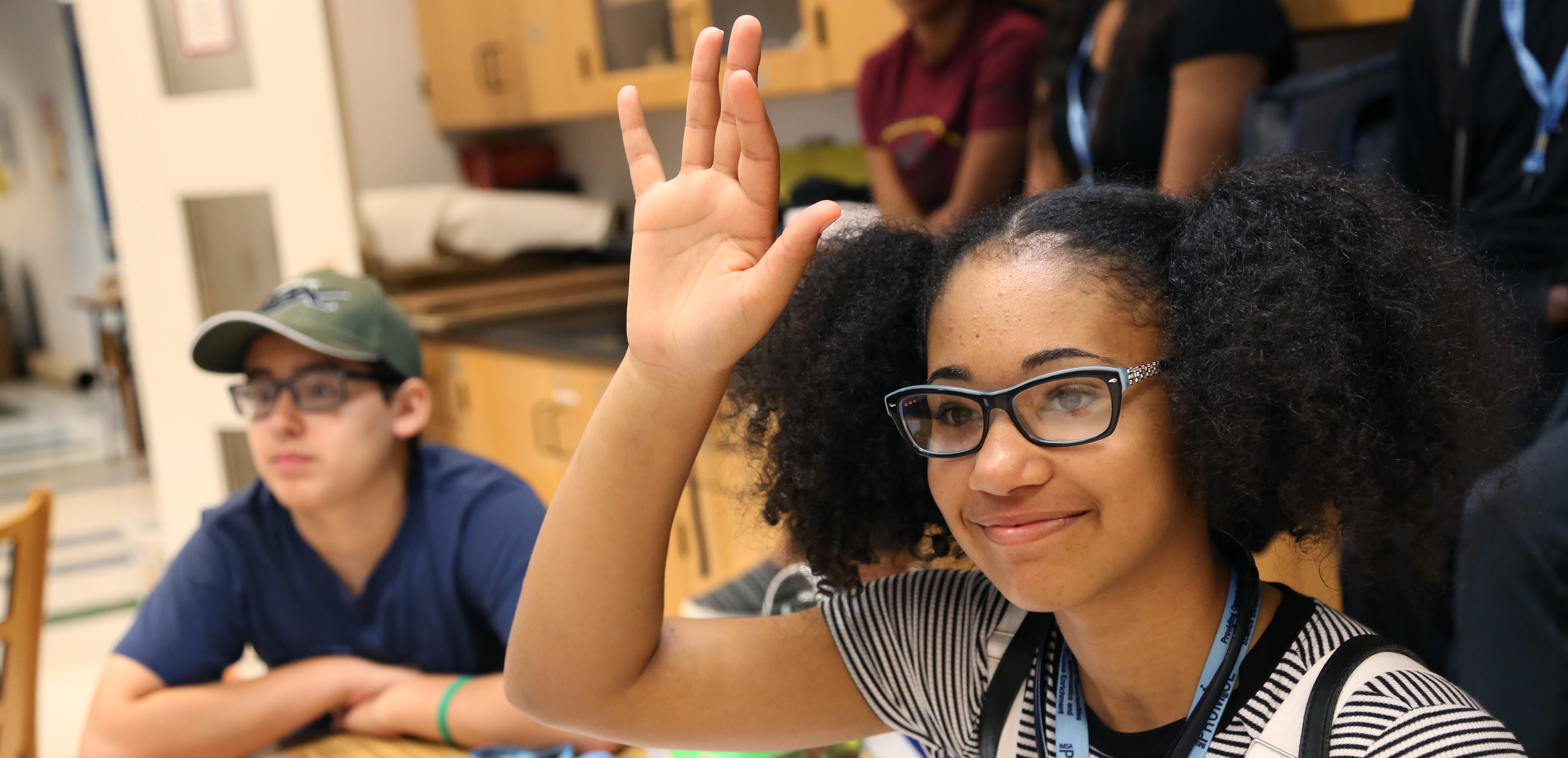Promise hand raising | Illinois Mathematics and Science Academy